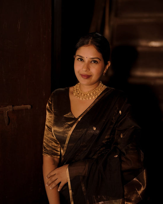 Black and gold maheshwari saree with zari bootis and zari lines all ov ...